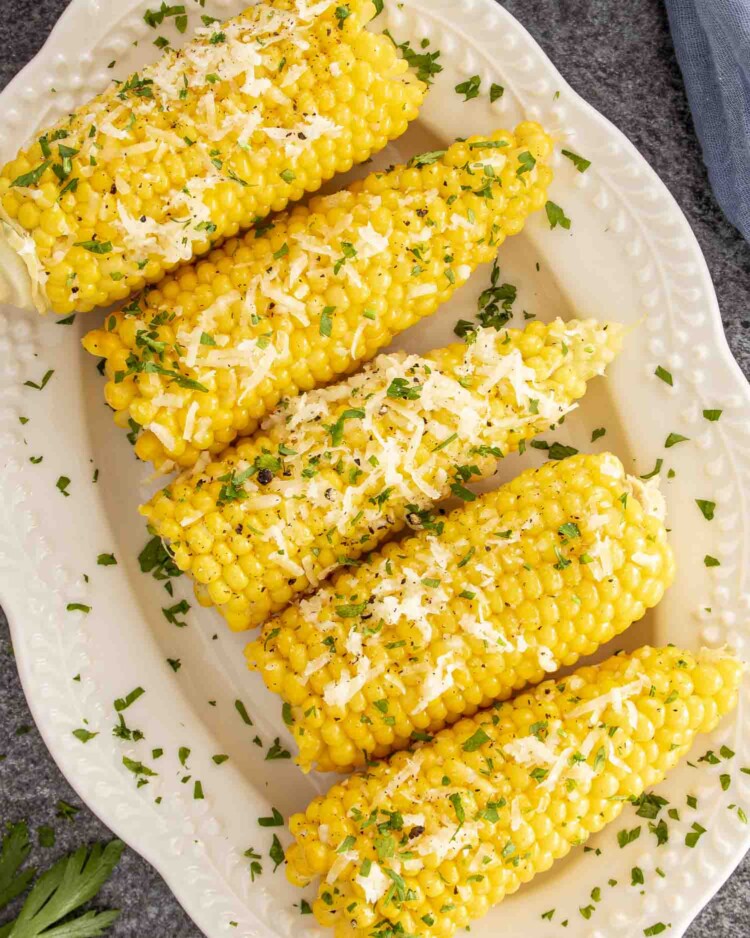 Garlic Parmesan Corn on the Cob - Craving Home Cooked
