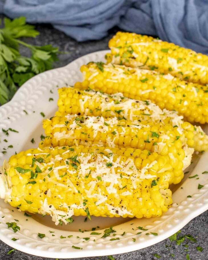 Garlic Parmesan Corn on the Cob - Craving Home Cooked